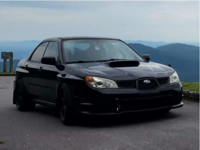 2007 Subaru Impreza with 18x9.5 35 ESR Sr07 and 255/35R18 Continental ...