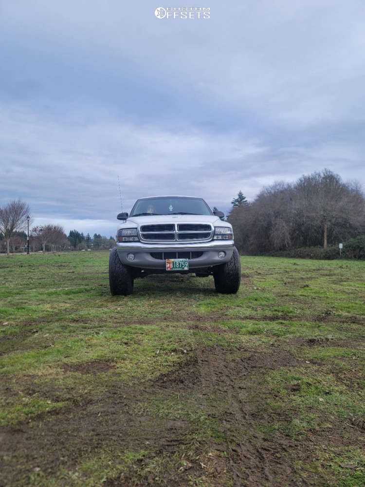 1999 Dodge Dakota with 20x12 -44 Anthem Off-Road Equalizer and 275 ...