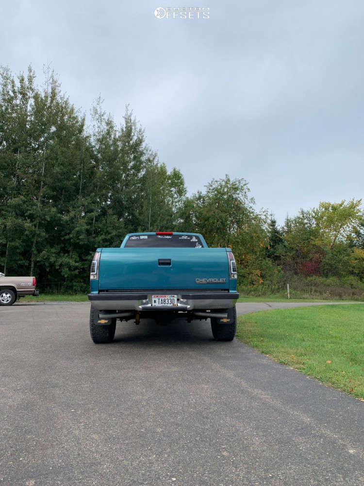 1998 Chevrolet K1500 with 15x12 -55 American Racing Bullet Hole and 32/ ...