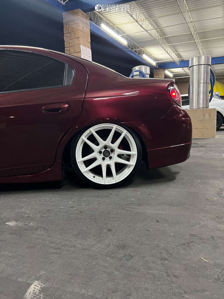 2005 Dodge Neon with 18x8.5 30 ESR Cs8 and 215/30R18 Black Hawk Street ...