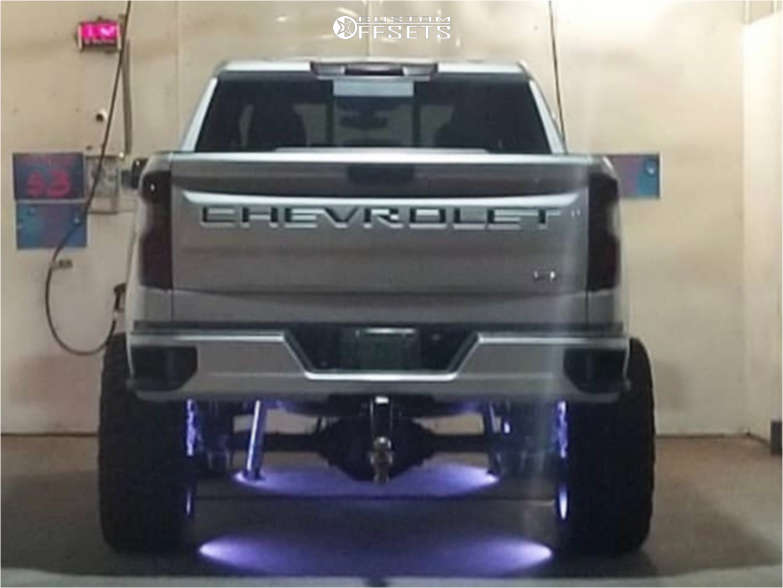 2020 Chevrolet Silverado 1500 with 24x12 -51 Vision Rocker 412 and 37/ ...