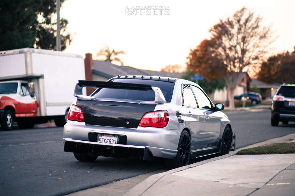 2004 Subaru Impreza with 18x8.5 44 SSR Gtx01 and 235/40R18 Hankook Ventus V12 Evo 2 and ...