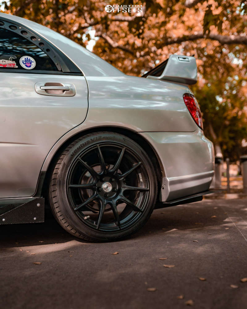 2004 Subaru Impreza with 18x8.5 44 SSR Gtx01 and 235/40R18 Hankook Ventus V12 Evo 2 and ...