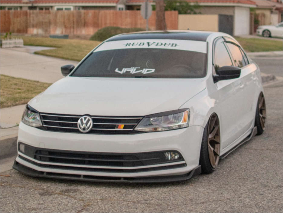 2016 Volkswagen Jetta with 18x9.5 35 Aodhan Aff7 and 215/35R18 Westlake ...