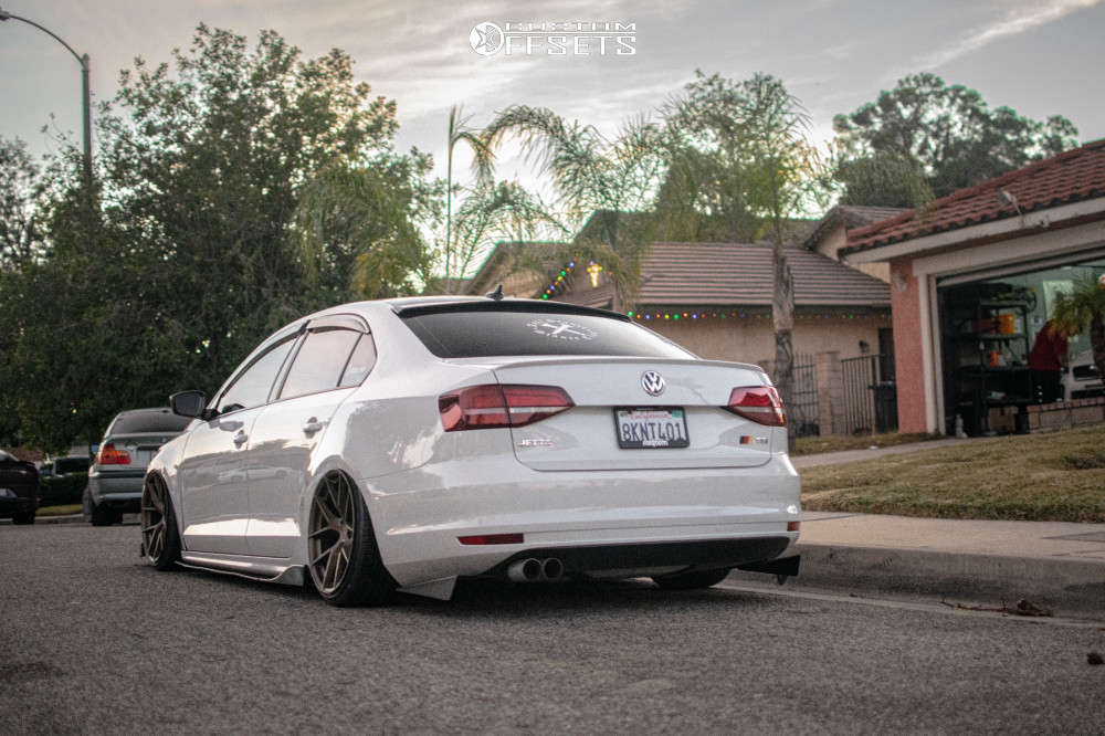 2016 Volkswagen Jetta with 18x9.5 35 Aodhan Aff7 and 215/35R18 Westlake ...