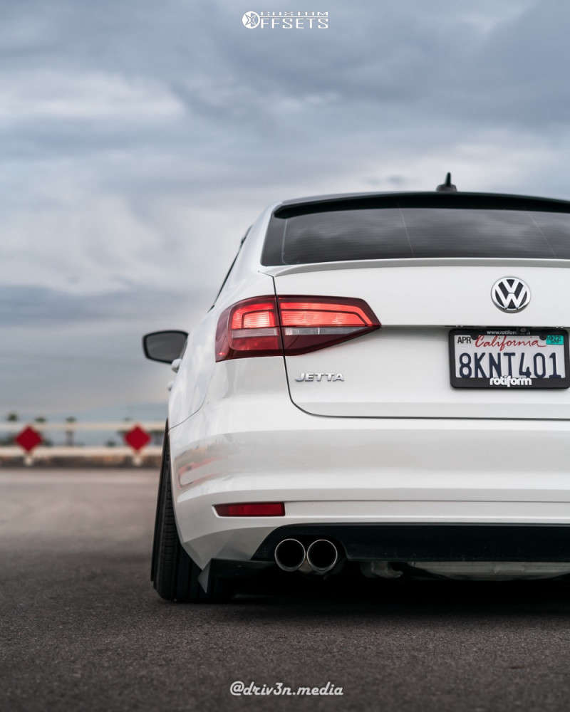 2016 Volkswagen Jetta with 18x9.5 35 Aodhan Aff7 and 215/35R18 Westlake ...