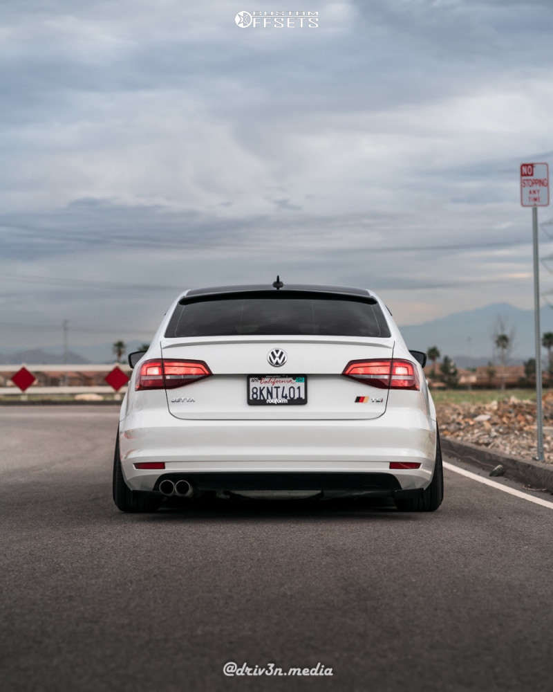 2016 Volkswagen Jetta with 18x9.5 35 Aodhan Aff7 and 215/35R18 Westlake ...