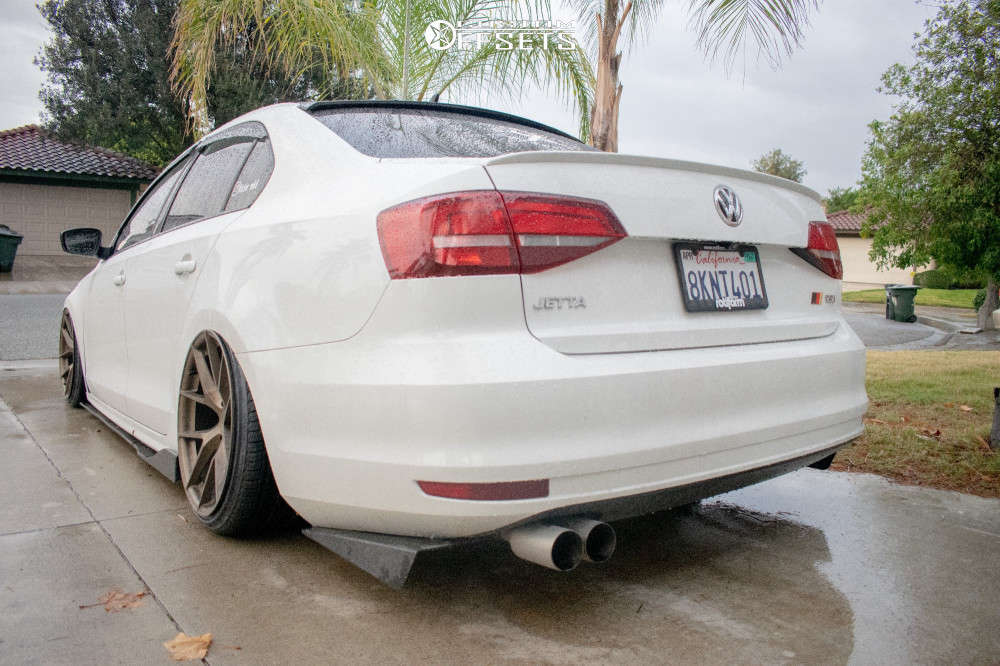 2016 Volkswagen Jetta with 18x9.5 35 Aodhan Aff7 and 215/35R18 Westlake ...