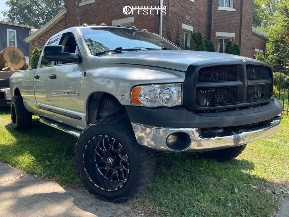 2005 Dodge Ram 2500 with 20x12 -44 TIS 544BM and 33/12.5R20 Nitto Mud ...