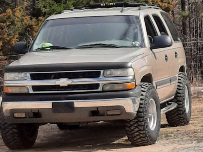 2005 Chevrolet Tahoe with 16x10 -25 American Racing Baja and 315/75R16 ...