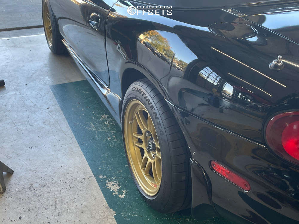 1999 Mazda Miata with 15x8 28 Enkei Rpf1 and 205/50R15 Continental Extremecontact Sport and ...