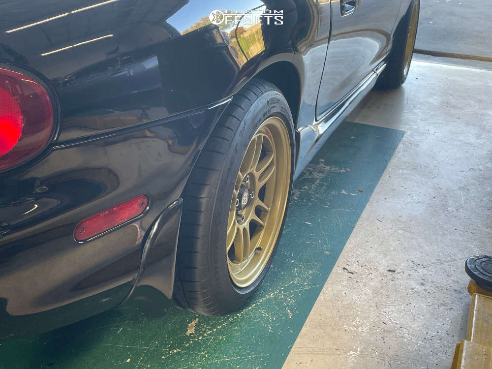 1999 Mazda Miata with 15x8 28 Enkei Rpf1 and 205/50R15 Continental Extremecontact Sport and ...