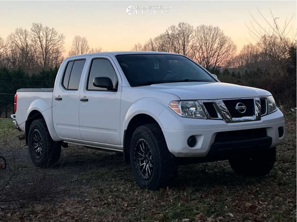 2012 Nissan Frontier with 18x9 -12 Fuel Rebel and 265/70R18 Falken ...
