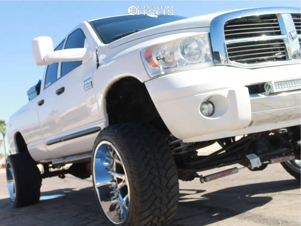 2009 Dodge Ram 2500 with 24x14 -71 Hostile Rage and 35/13.5R24 AMP Mud ...