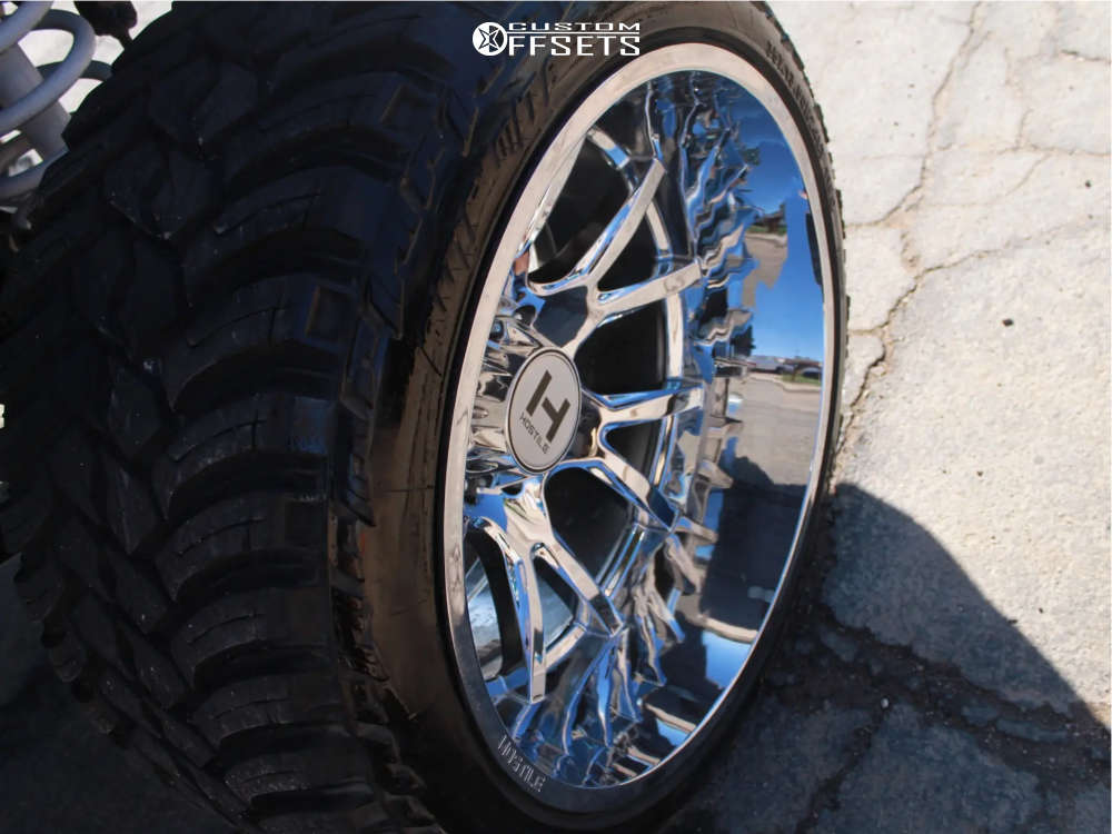 2009 Dodge Ram 2500 with 24x14 -71 Hostile Rage and 35/13.5R24 AMP Mud ...