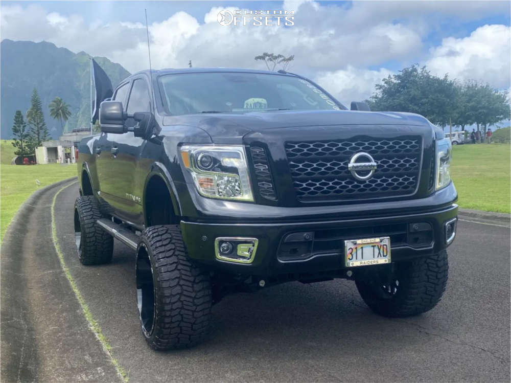 2019 Nissan Titan with 24x14 -76 TIS 544BM and 35/13.5R24 Radar ...