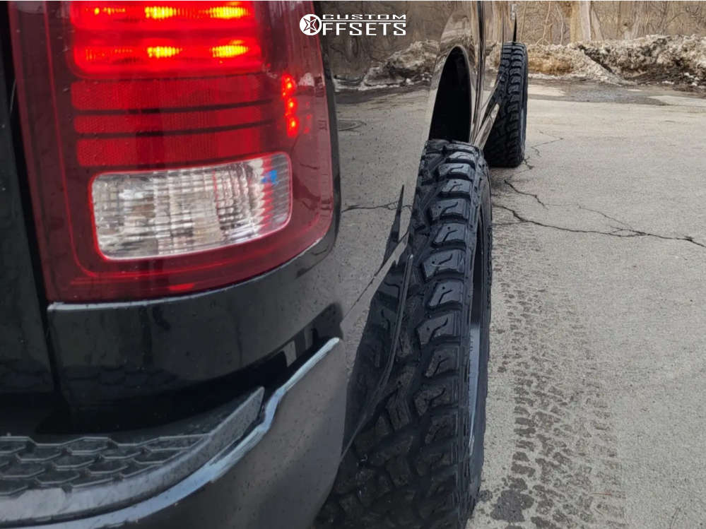 2014 Ram 1500 with 20x10 -18 Massiv Offroad Or1 and 33/12.5R20 Predator ...