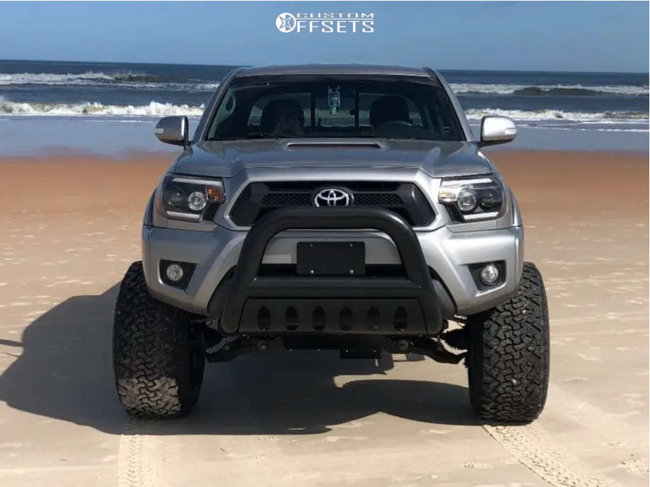 2015 Toyota Tacoma with 20x14 -76 Scorpion Sc10 and 33/12.5R20 Venom Power Terra Hunter X/t and ...