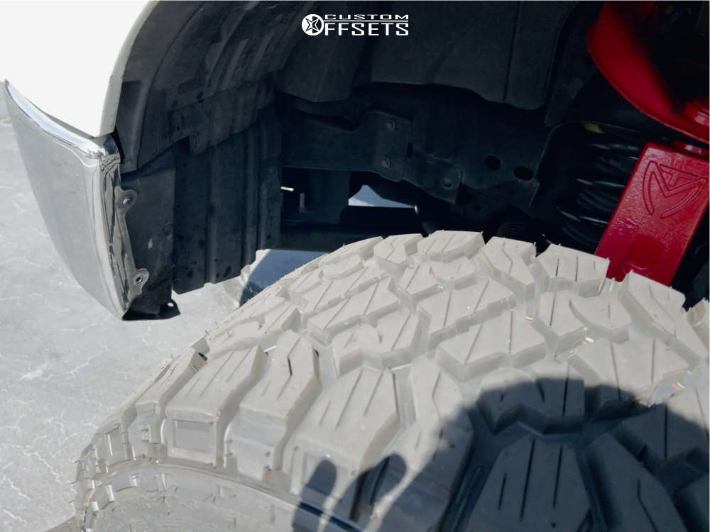 2017 Nissan Titan with 22x12 -51 Vision Rocker 412 and 33/12.5R22 Kenda ...