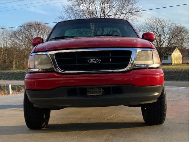 2003 Ford F-150 with 16x9 -12 Helo He878 and 265/70R16 Goodyear ...
