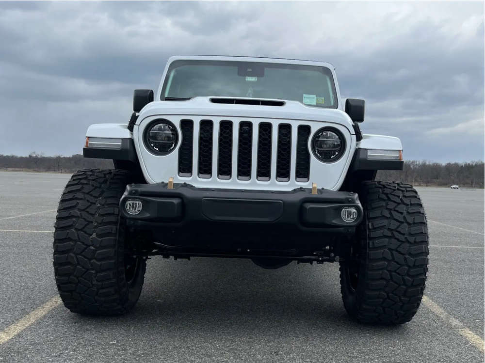 2021 Jeep Wrangler with 20x12 -44 TIS 560B and 38/15.5R20 Cooper ...
