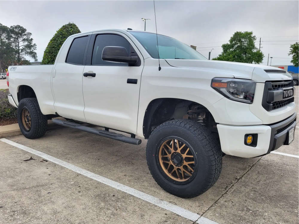 2014 Toyota Tundra with 20x9 18 KMC Km535 and 35/12.5R20 Yokohama Geolander A/t G015 and ...