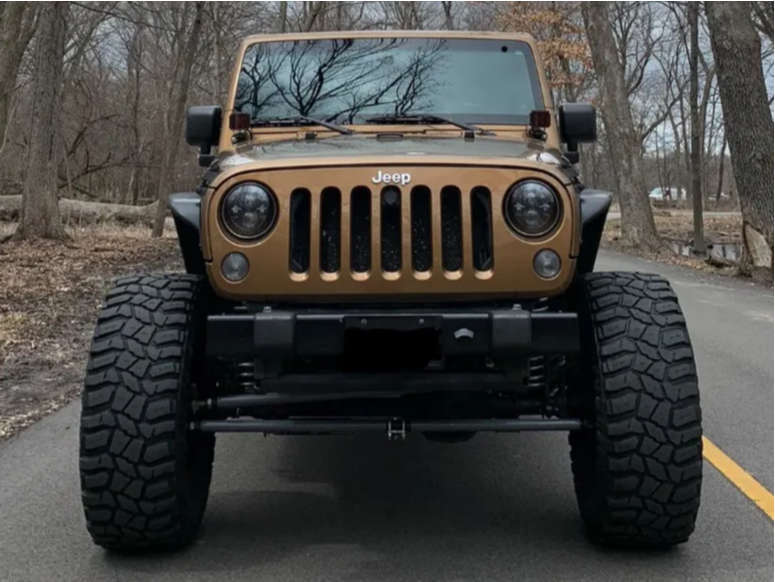 2011 Jeep Wrangler with 18x9 -12 Vision Manx and 37/13.5R18 Cooper ...