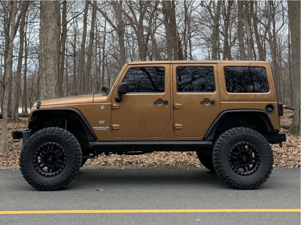 2011 Jeep Wrangler with 18x9 -12 Vision Manx and 37/13.5R18 Cooper ...