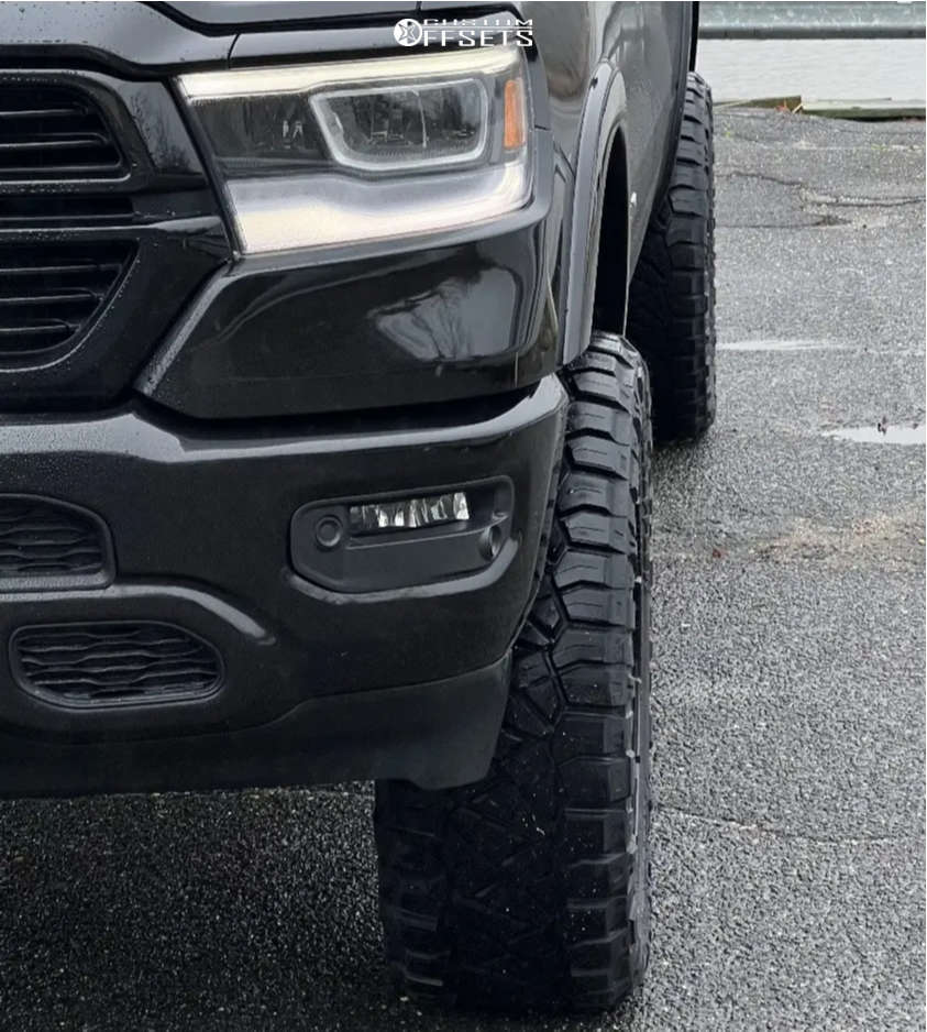 2020 Ram 1500 with 22x10 -13 Fuel Rebel and 35/12.5R22 Nitto Ridge ...