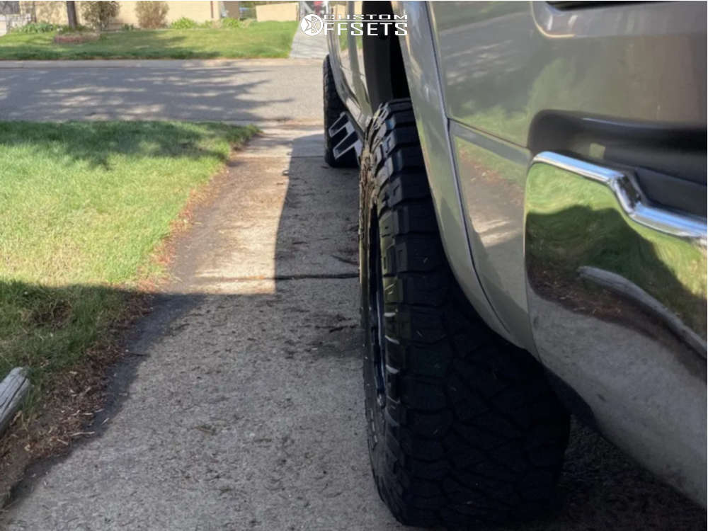 2017 Ram 2500 with 18x9 18 Vision Nemesis and 35/12.5R18 Nitto Ridge ...