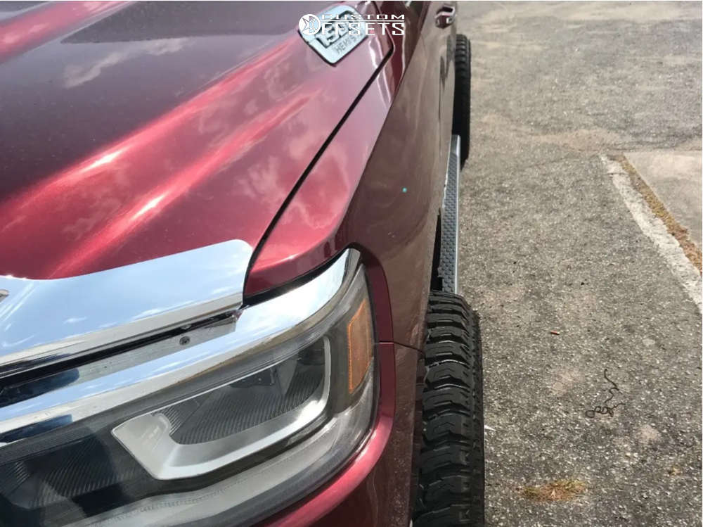 2019 Ram 1500 with 22x12 -44 Off Road Monster M24 and 305/45R22 Atturo ...