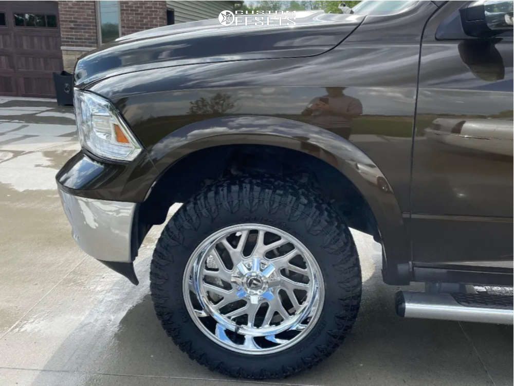 2013 Ram 1500 with 20x10 -18 Fuel Triton and 33/12.5R20 Radar Renegade ...