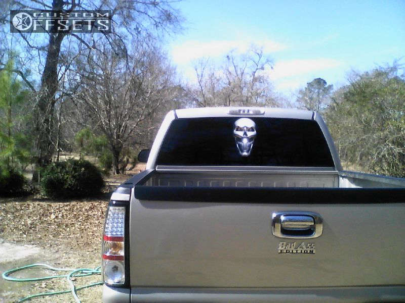 2004 GMC Sierra 1500 with 20x8.5 13 U2 55 and 33/12.5R20 Nitto Mud ...