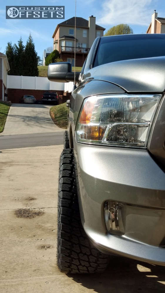 2013 Ram 1500 with 20x10 -18 Fuel Anza and 305/55R20 Nitto Terra ...