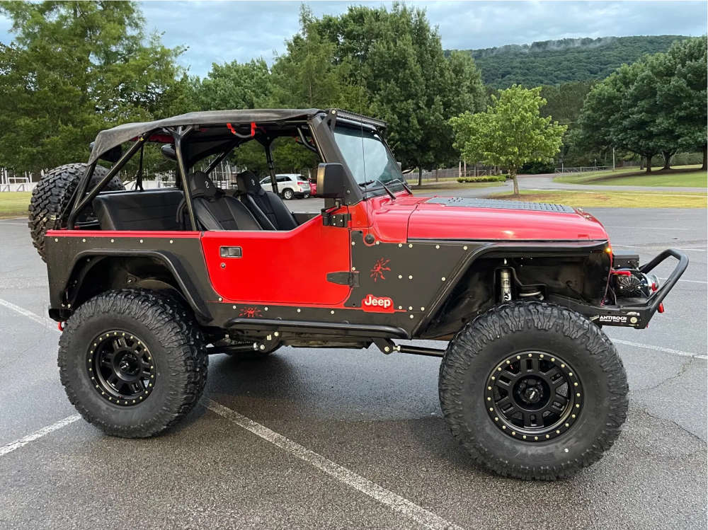 1997 Jeep Wrangler with 17x8.5 Vision Manx and 37/12.5R17 Milestar ...