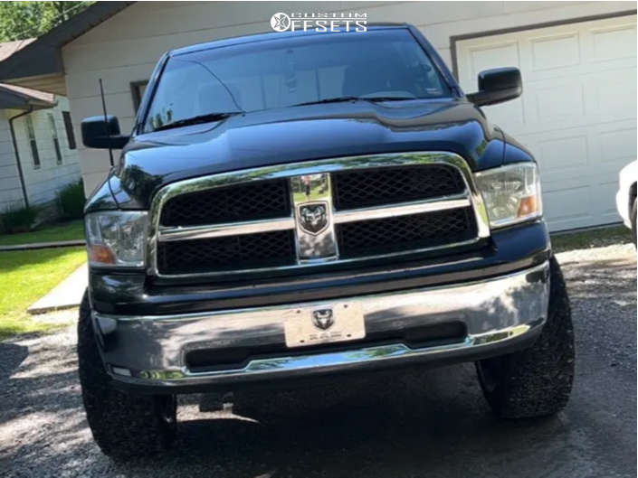2010 Dodge Ram 1500 with 22x12 -44 RBP 80r and 35/12.5R22 Venom Power ...