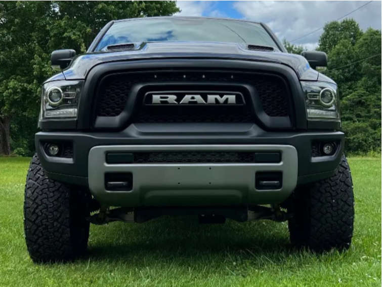 2016 Ram 1500 with 20x12 -51 Vision Rocker 412 and 35/12.5R20 Venom ...