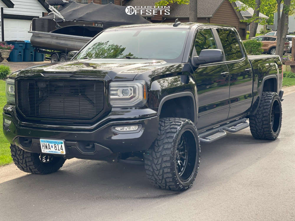 2016 GMC Sierra 1500 with 22x12 -44 TIS 557B and 33/13.5R22 Versatyre Mxt and Suspension Lift 4. ...