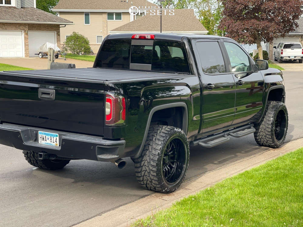 2016 GMC Sierra 1500 with 22x12 -44 TIS 557B and 33/13.5R22 Versatyre Mxt and Suspension Lift 4. ...