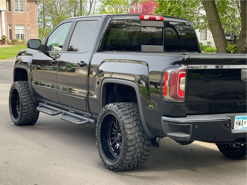 2016 GMC Sierra 1500 with 22x12 -44 TIS 557B and 33/13.5R22 Versatyre Mxt and Suspension Lift 4. ...