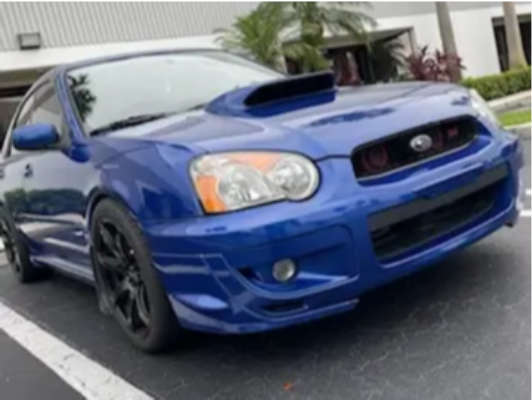 2004 Subaru Impreza with 18x8.5 35 XXR 560 and 245/40R18 Dcenti D6000 ...