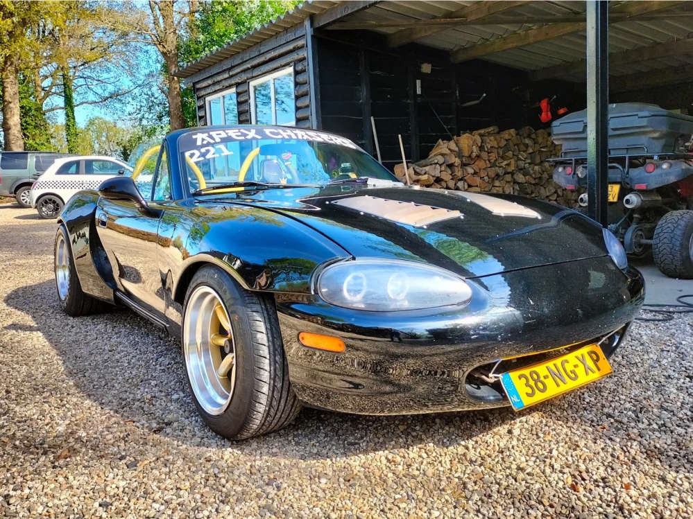 1999 Mazda Miata with 15x9 -13 Japan Racing JR19 and 205/55R15 Nankang ...