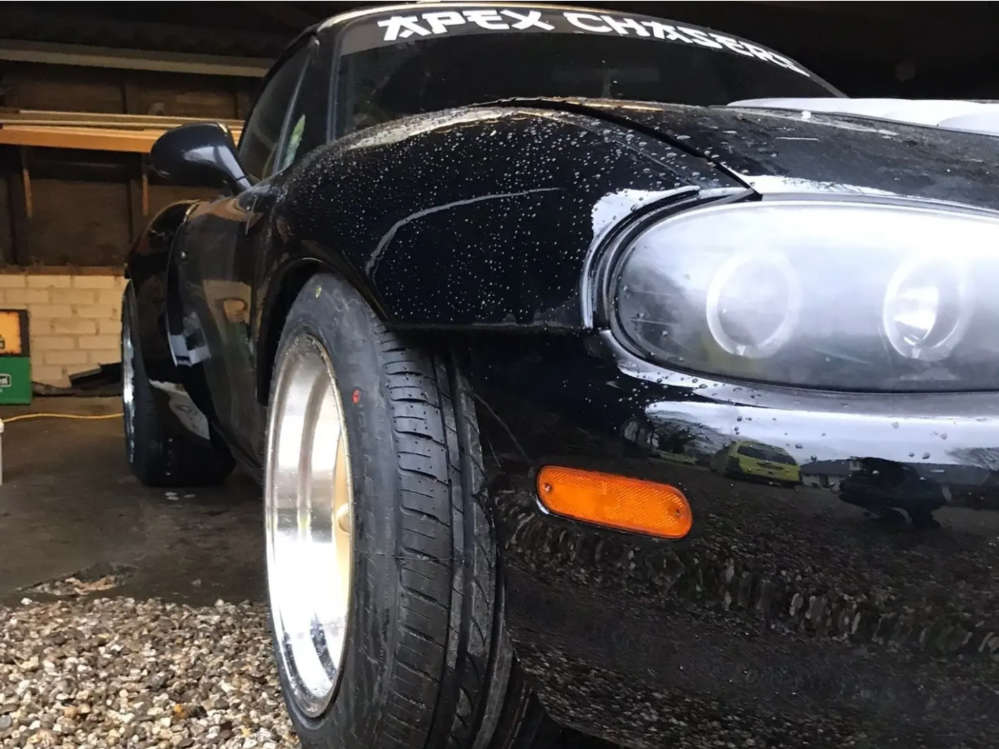 1999 Mazda Miata with 15x9 -13 Japan Racing JR19 and 205/55R15 Nankang ...