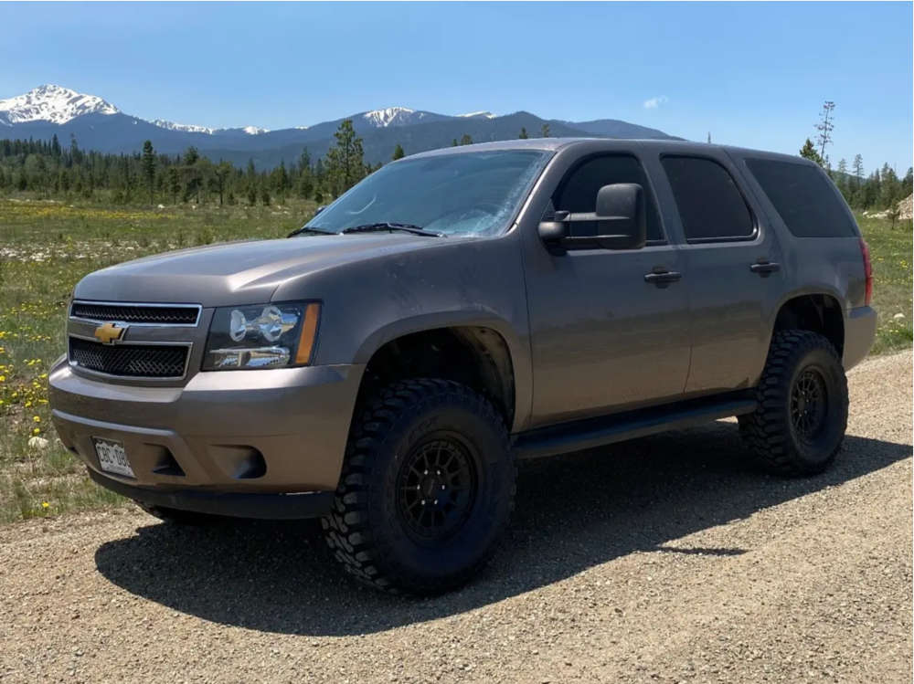 2014 Chevrolet Tahoe with 17x8.5 0 KMC Km719 and 35/12.5R17 Nexen ...