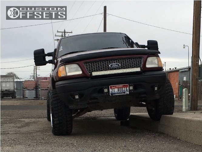 1999 Ford F-150 with 20x12 -44 Moto Metal MO962 and 33/12.5R20 Goodyear ...