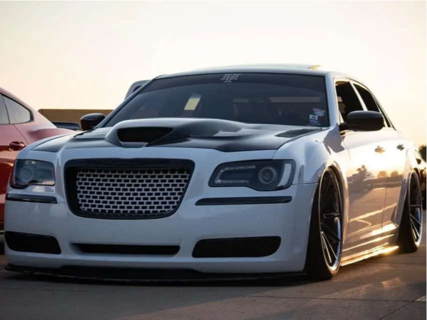 2012 Chrysler 300 with 22x9.5 12 Ferrada CM2 and 265/30R22 Continental ...