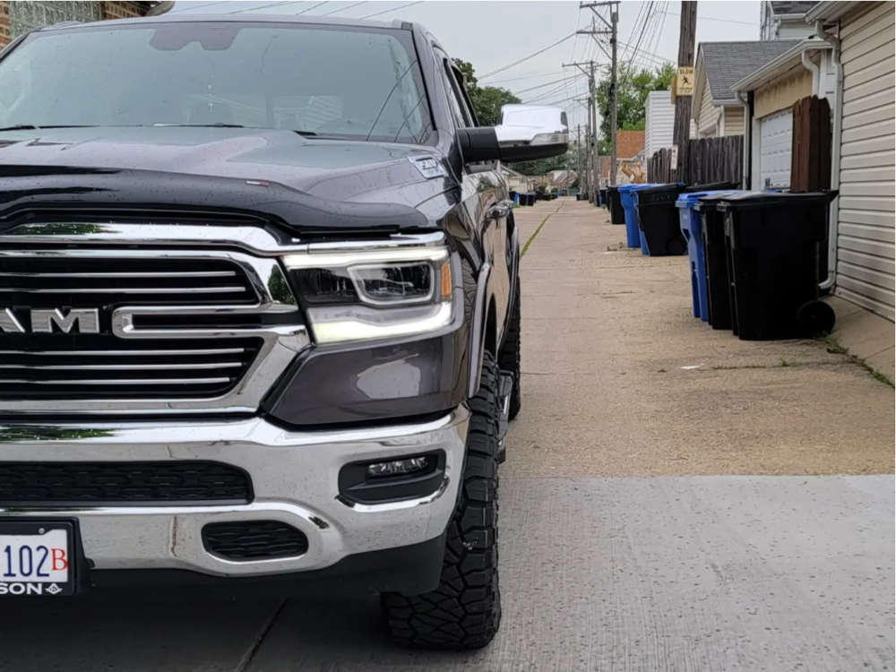 2022 Ram 1500 with 20x9 1 Fuel Assault D576 and 35/12.5R20 Nitto Ridge ...