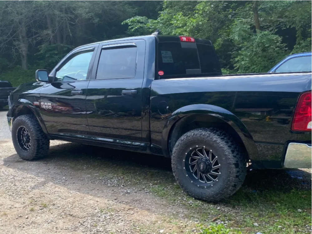 2016 Ram 1500 with 17x9 0 Impact 811gbs and 33/12.5R17 Venom Power ...