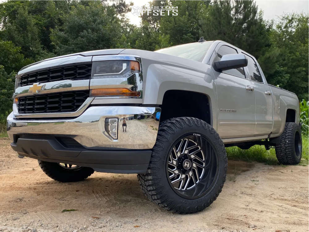 2016 Chevrolet Silverado 1500 with 20x12 -44 Hostile Jigsaw and 33/12 ...