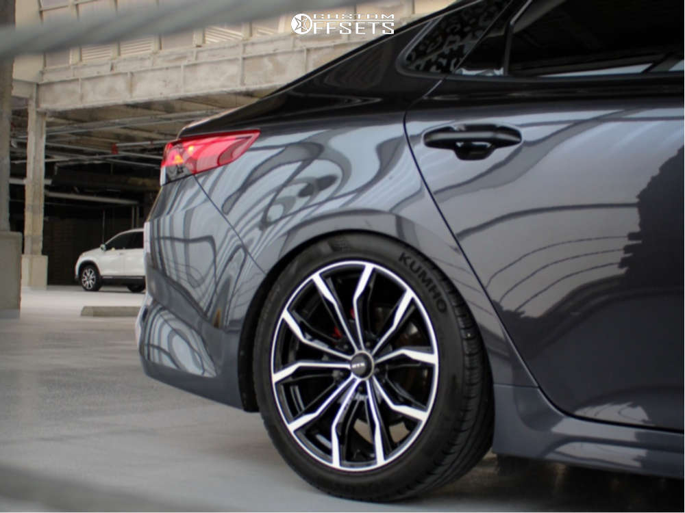 2018 Kia Optima with 18x8 42 RTX Black Widow and 235/45R18 Kumho Solus ...